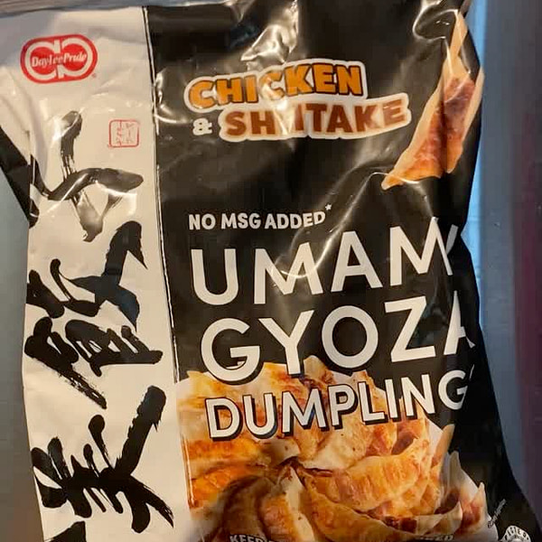Trying Chicken and Shiitake umami gyoza dumplings